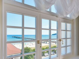 Suite, vista para o mar | 1 quarto, roupa hipoalergénica, minibar grátis, cofre no quarto 