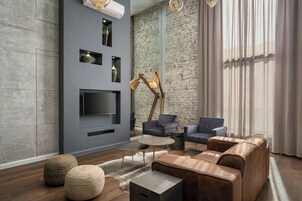 Loft, 2 quartos | Lounge | Serve pequenos-almoços, almoços e jantares 
