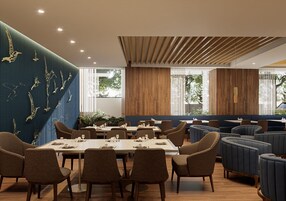 Uma área de jantar moderna com uma mesa comprida, várias cadeiras e uma parede azul com um mural de pássaros.