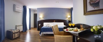 Suite Júnior | Minibar, cofre no quarto, secretária, Wi-fi grátis 