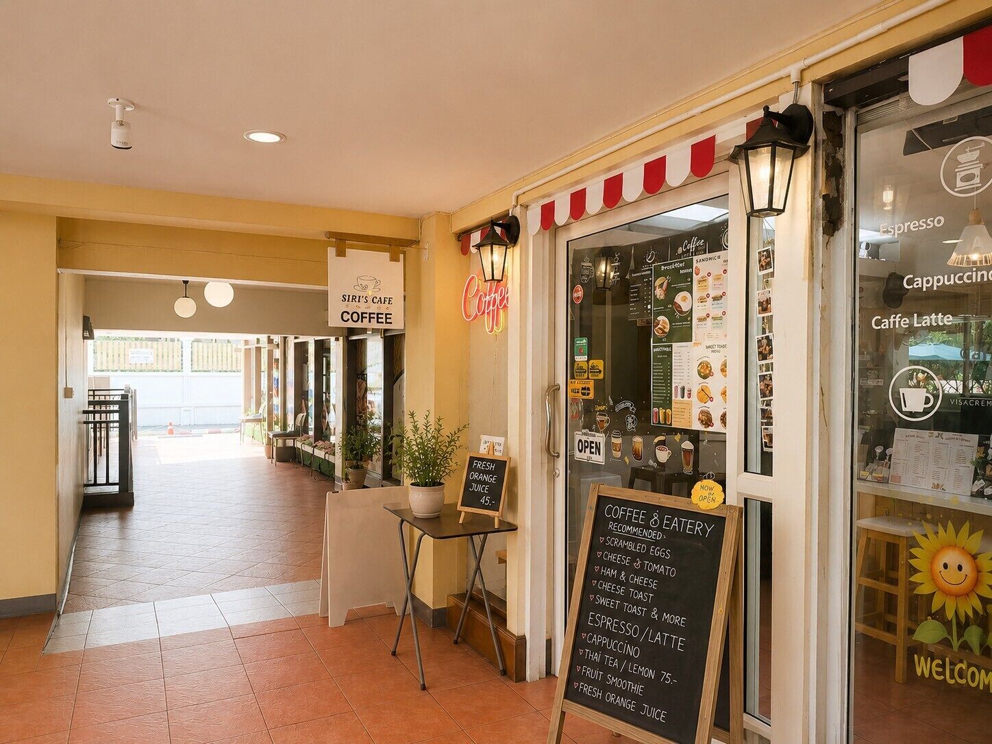 Um café com uma placa exibindo itens de café e comida, um cardápio em lousa e um letreiro acolhedor com a palavra 'Welcome'.