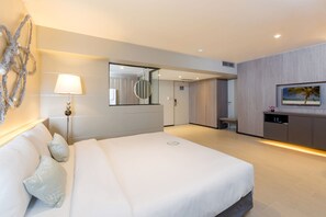 Suíte júnior | Frigobar, cofres nos quartos, escrivaninha, cortinas blackout