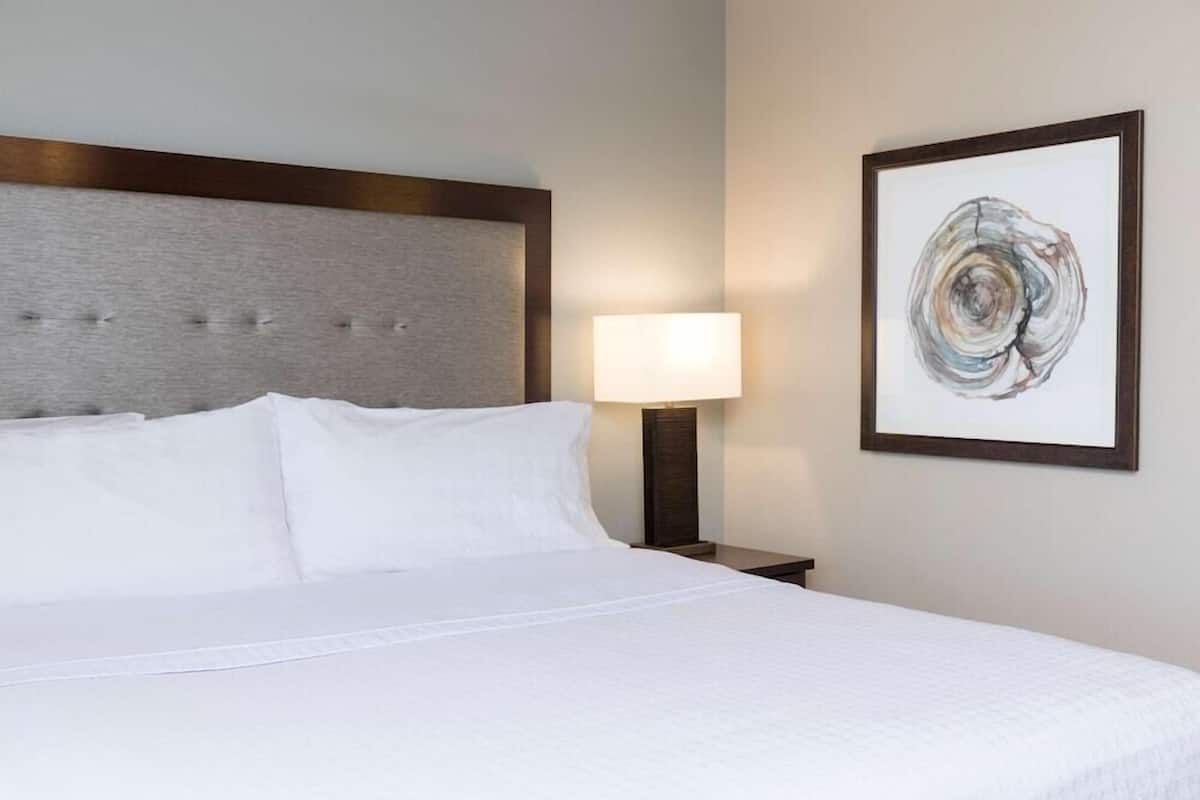 Roupas de cama premium, cofres nos quartos, individualmente mobiliados