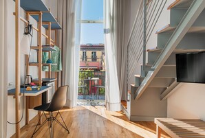 Quarto quádruplo família (Scala interna) | Roupas de cama premium, frigobar, cofres nos quartos