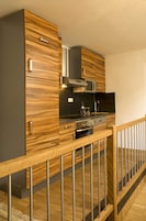 Apartamento Deluxe, no edifício anexo | Kitchenette privada