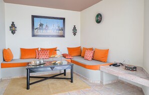 Apartamento Deluxe | Sala de estar | Televisor LCD 