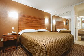 Quarto Standard, 1 cama king-size, fumadores | Secretária, ferro/tábua de engomar, Wi-fi grátis