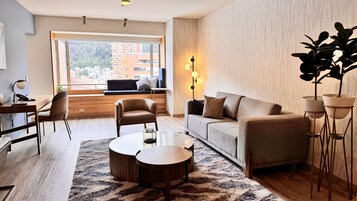Family Suite Executive | Cofres nos quartos, individualmente mobiliados, escrivaninha