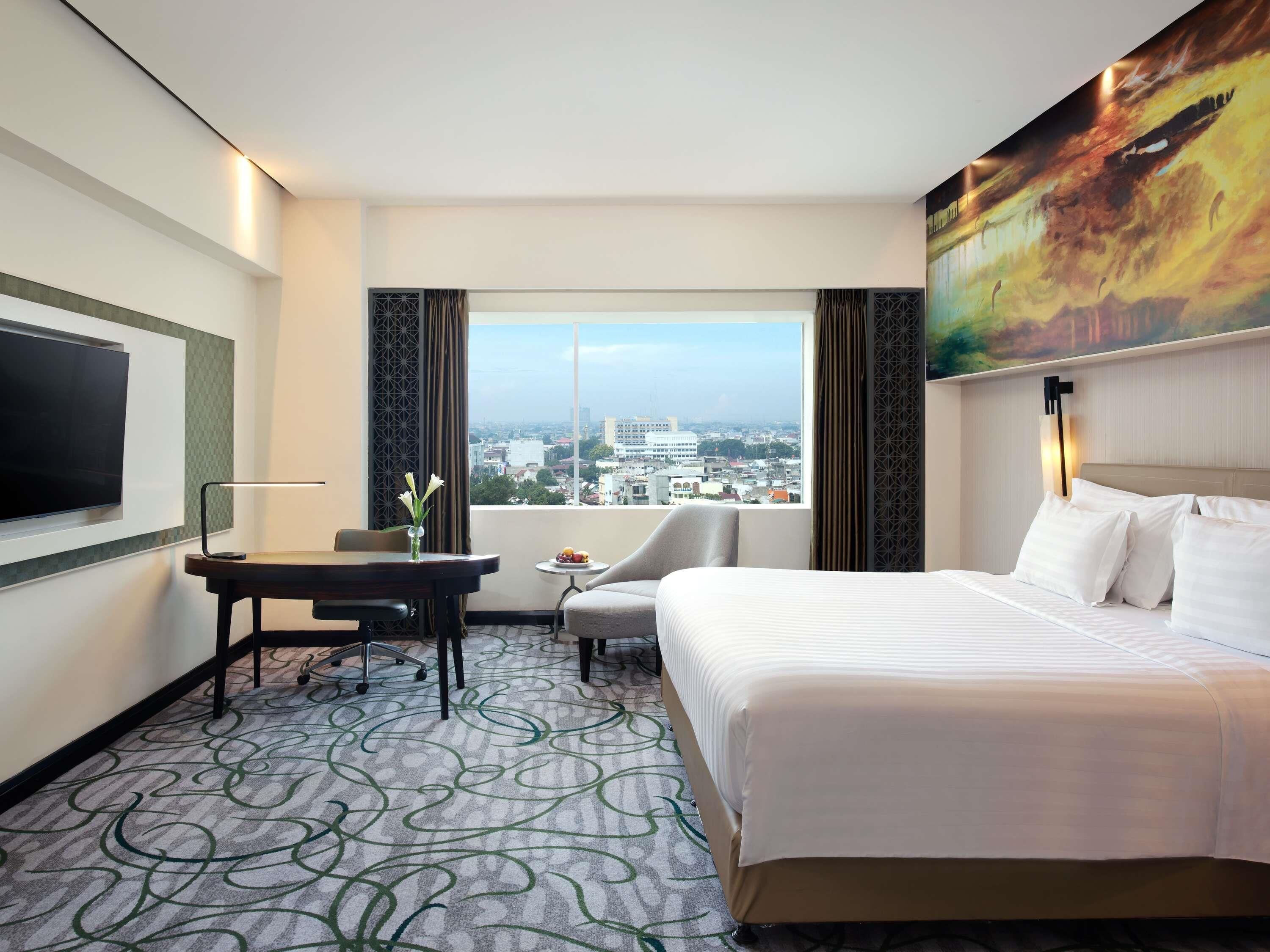 Suite Júnior, 1 cama king-size | Minibar, cofre no quarto, secretária, cortinas/cortinados opacos 