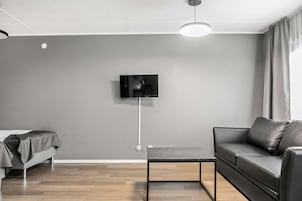 Quarto duplo superior | Ferros/tábuas de passar roupa, Wi-Fi de cortesia, roupa de cama