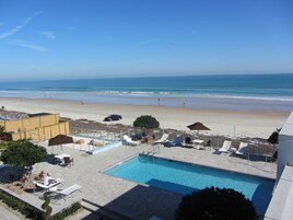 Na praia, barracas de praia (sobretaxa) 