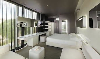 Junior Suite | Edredons de pluma, frigobar, cofres nos quartos, escrivaninha