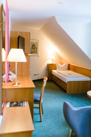 Quarto Individual Comfort | Secretária, Wi-fi grátis, roupa de cama fornecida 