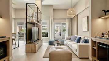 Suite, piscina privativa (METT, Private Garden) | Sala | Televisor de 55 polegadas com canais por cabo