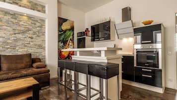 Apartamento Deluxe, 1 cama queen-size e sofá-cama | Cozinha privada