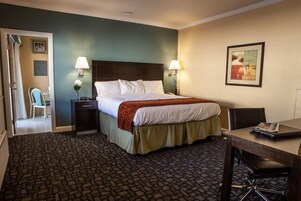 Suite Executiva, 1 cama king-size | Camas de colchão pillowtop, cofre no quarto, secretária 