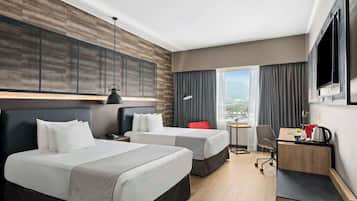 1 quarto, roupa de alta qualidade, camas de colchão pillowtop, minibar