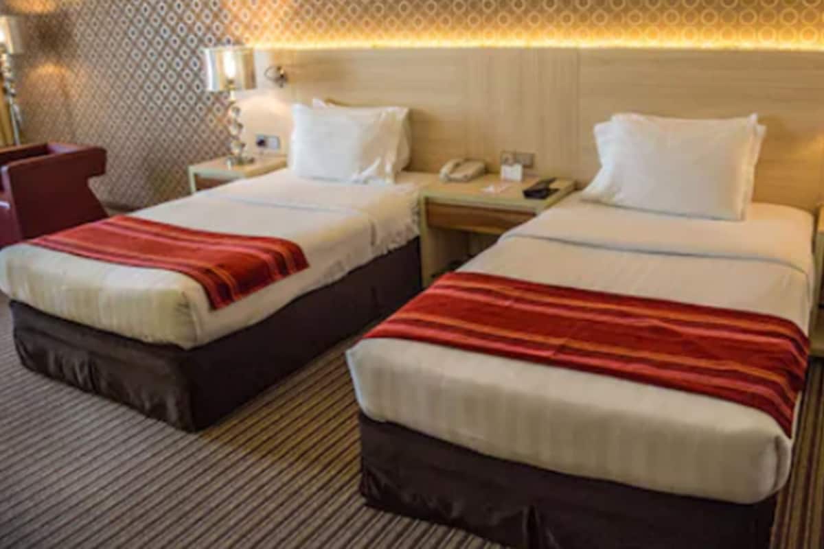Quarto superior | Frigobar, cofres nos quartos, escrivaninha, cortinas blackout