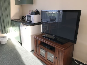 Apartamento Deluxe, 1 quarto, banheira de hidromassagem | Comodidade do quarto