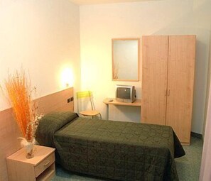 Quarto Individual Clássico, 1 cama individual | Secretária, quartos insonorizados, Wi-fi grátis 