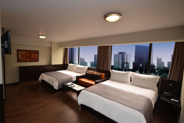 Suite, 2 camas queen-size | Vista do quarto