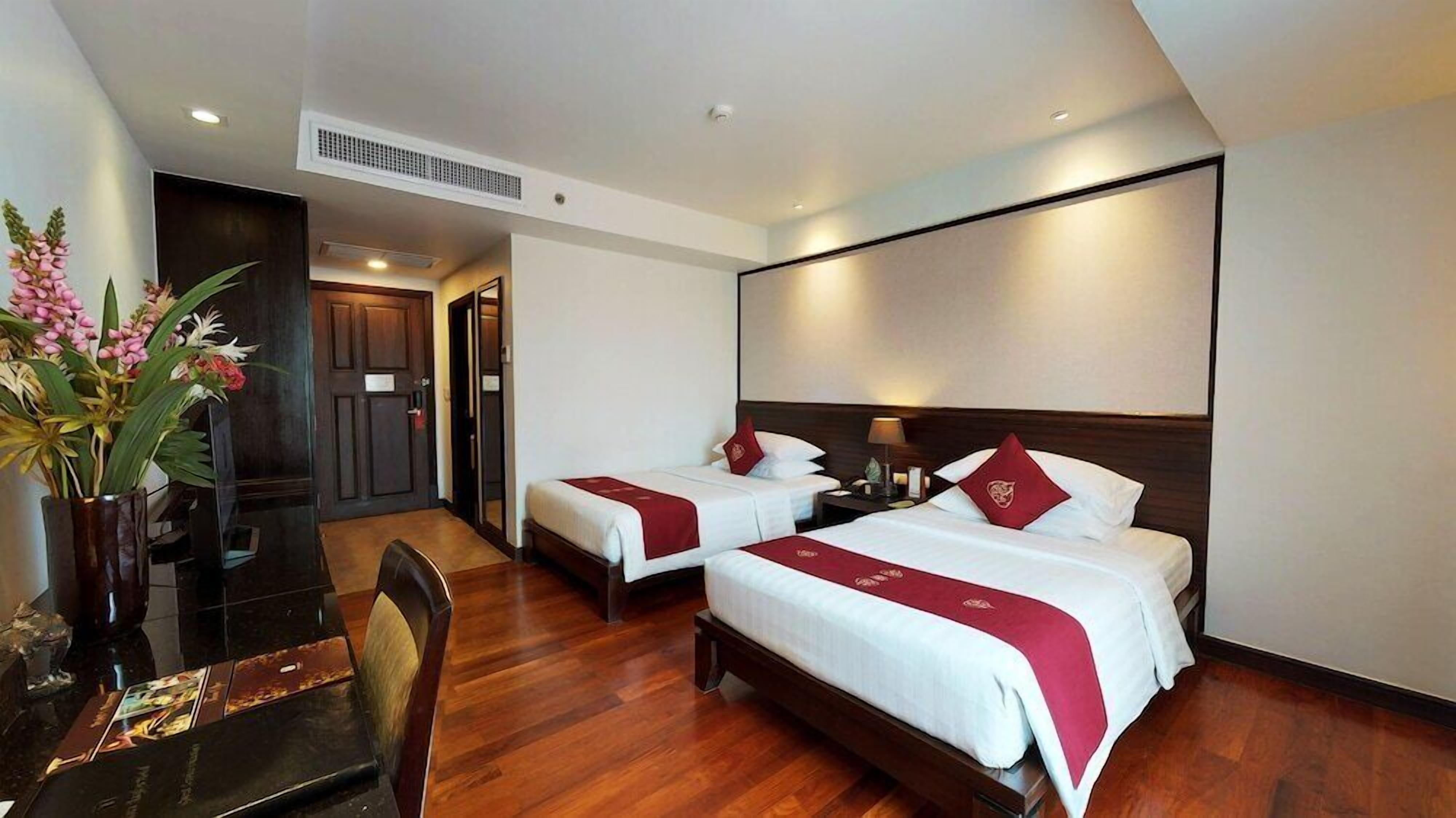 Roupa de alta qualidade, camas de colchão pillowtop, minibar 