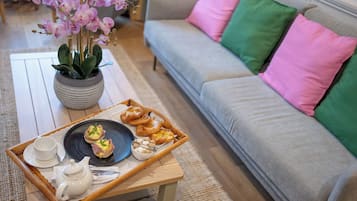 Suite, 1 cama king-size | Sala de estar