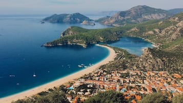 Perto da praia, serviço de traslado de/para a praia grátis