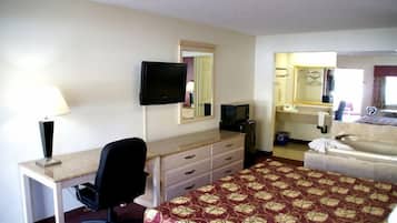 Suite Deluxe, 1 cama king-size, banheira de hidromassagem | Secretária, ferro/tábua de engomar, Wi-fi grátis