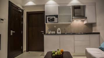 Suíte, 2 quartos | Cozinha privada | Chaleira elétrica