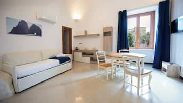 Camera quadrupla luxury | 1 quarto, frigobar, escrivaninha, cortinas blackout