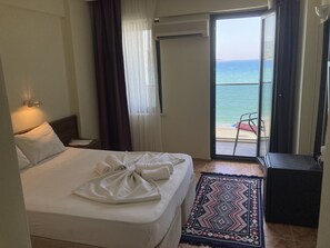 Quarto casal ou duplo, vista para o mar | Roupas de cama premium, frigobar, Wi-Fi de cortesia, roupa de cama