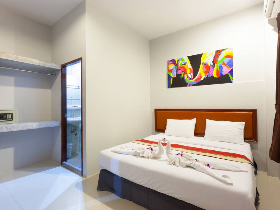 Quarto luxo, 1 cama King, para não fumantes, vista para a cidade | Edredons de pluma, frigobar, cofres nos quartos, escrivaninha