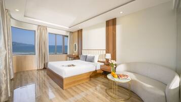 Suíte luxo, vista para o oceano | 1 quarto, frigobar, cofres nos quartos, escrivaninha