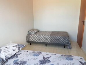 Quarto quádruplo superior, 2 quartos (101) (Varanda) | 1 quarto, roupas de cama antialérgicas, cortinas blackout