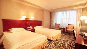 Quarto superior | Frigobar, escrivaninha, cortinas blackout, Wi-Fi de cortesia