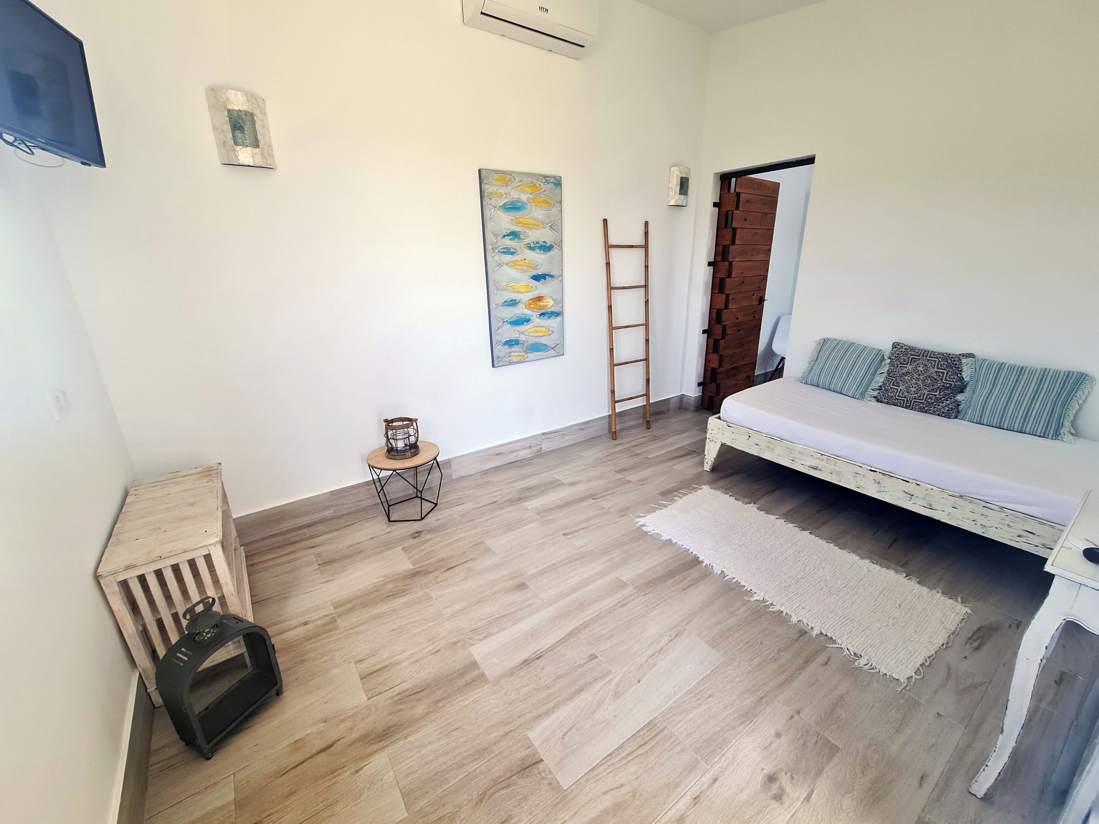 Suite Standard, 1 quarto | Sala de estar | Televisor 