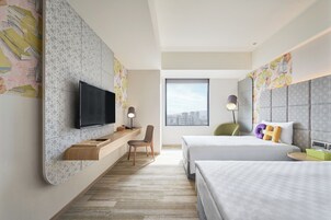 Quarto Twin Deluxe (Discovery) | Edredões de penas, cofre no quarto, com decoração personalizada 