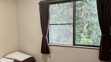 Quarto tradicional (Japanese Style) | Espaço de trabalho para notebook, Wi-Fi de cortesia, roupa de cama
