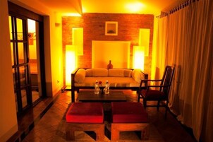 Quarto Duplo Deluxe | Sala de estar