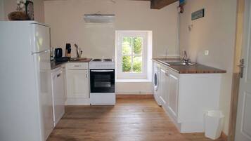 Cozinha privada | Um frigorífico/congelador grande, um micro-ondas, um forno