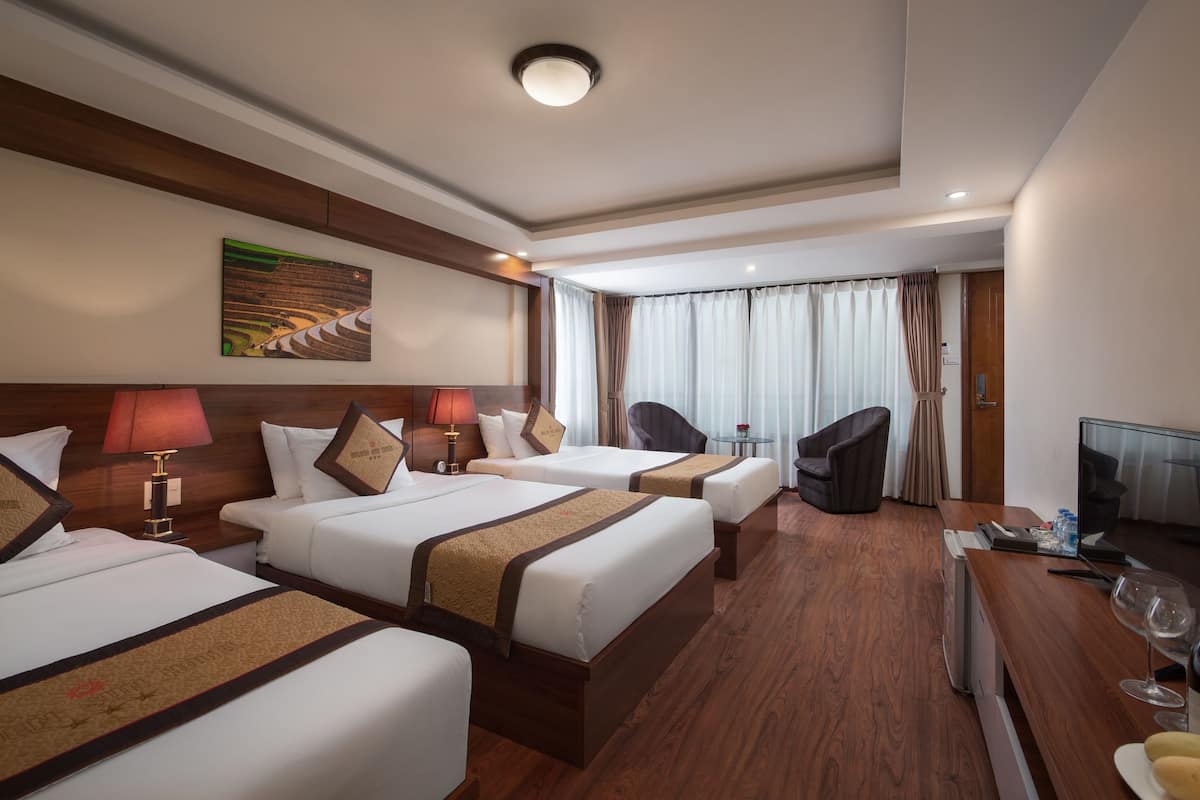 Quarto triplo | Frigobar, cofres nos quartos, escrivaninha, cortinas blackout