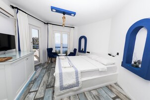 Suíte luxo, 1 quarto | 1 quarto, roupas de cama premium, frigobar, cofres nos quartos