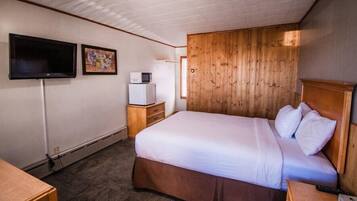Quarto, 1 cama Queen | Camas extras/dobráveis (sobretaxa), Wi-Fi de cortesia, roupa de cama