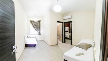 Quarto Familiar (Camelia) | Minibar, secretária, quartos insonorizados, Wi-fi grátis