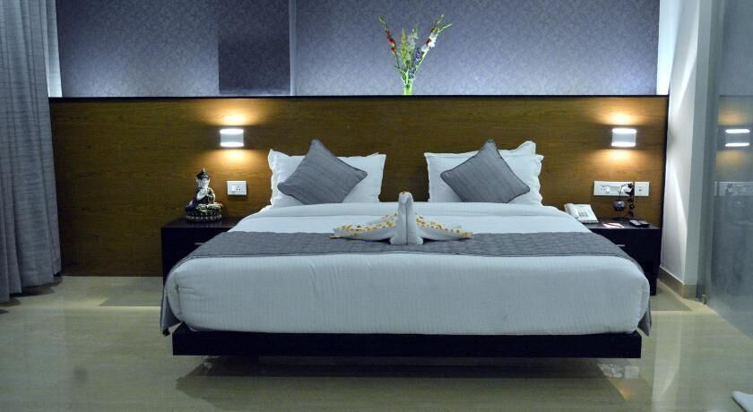 Roupa de alta qualidade, edredões de penas, minibar 