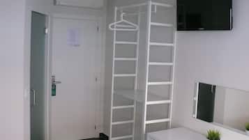 Quarto Duplo Deluxe, casa de banho privativa | Comodidade do quarto