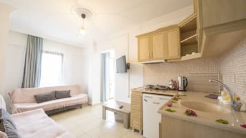 Apartamento, 2 quartos | 1 quarto, secretária, quartos insonorizados, ferro/tábua de engomar
