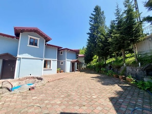 Villa Deluxe, em frente ao mar | Sala de estar | TV de ecrã plano 