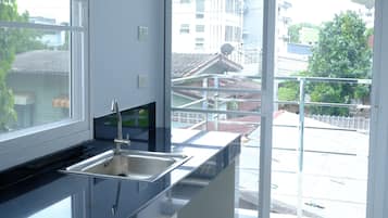 Suíte executiva, 1 cama King | Comodidades do quarto
